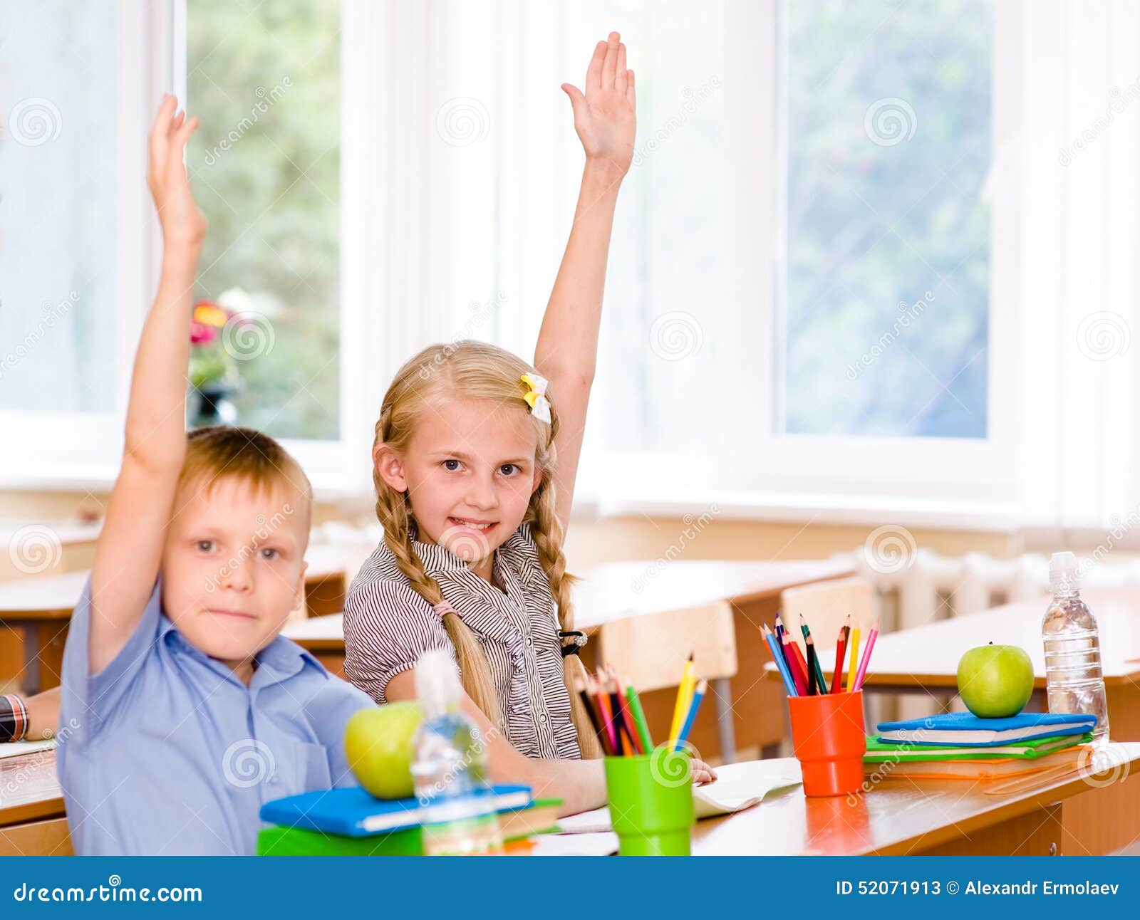 Children Raising Hands Knowing the Answer To the Question Stock Image ...