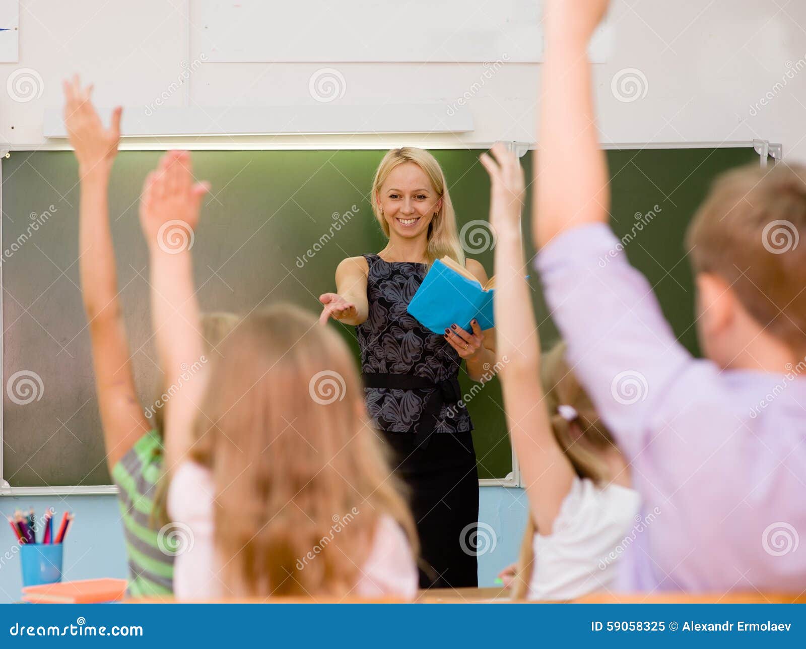Children Raising Hands Knowing the Answer To the Question Stock Image ...