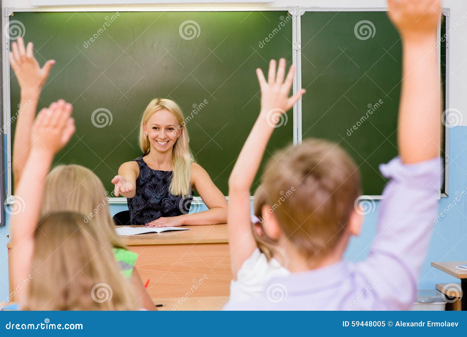 Children Raising Hands Knowing the Answer To the Question Stock Image ...