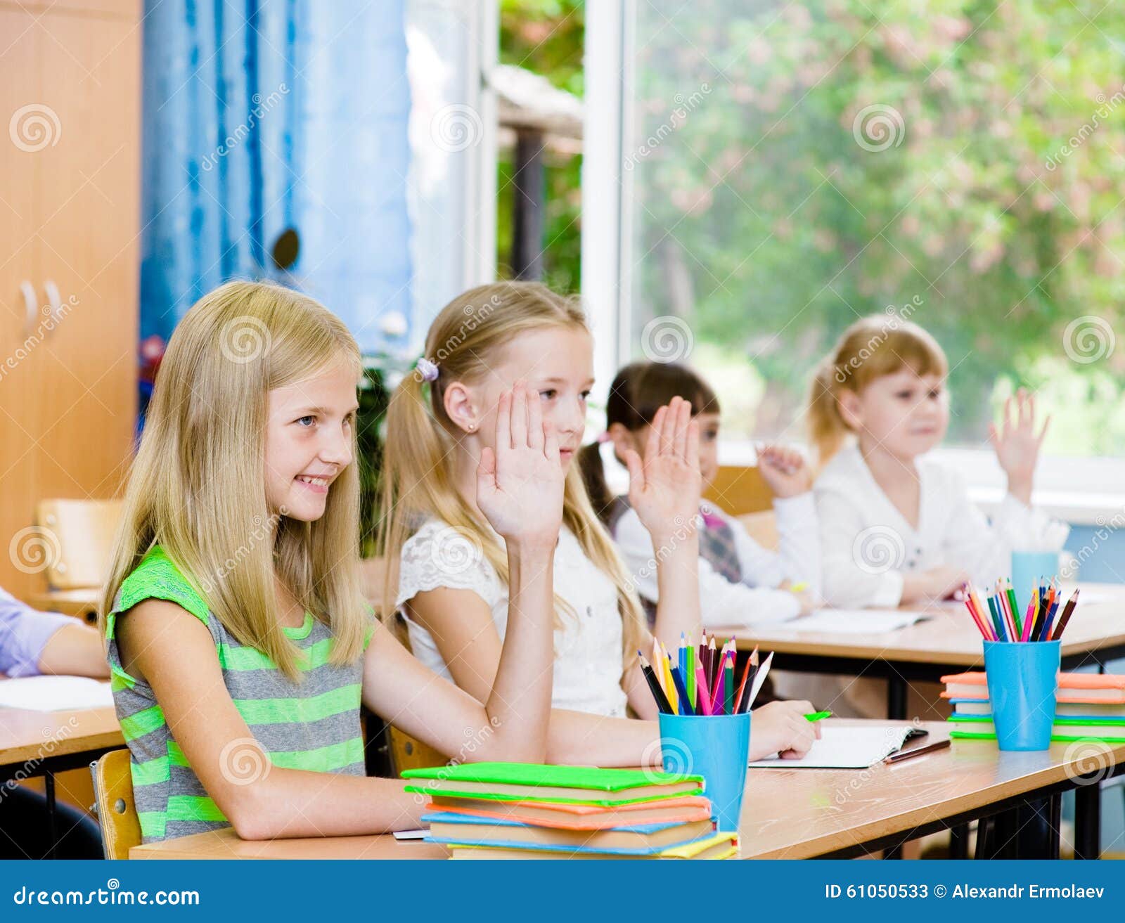 Children Raising Hands Knowing the Answer To the Question Stock Image ...