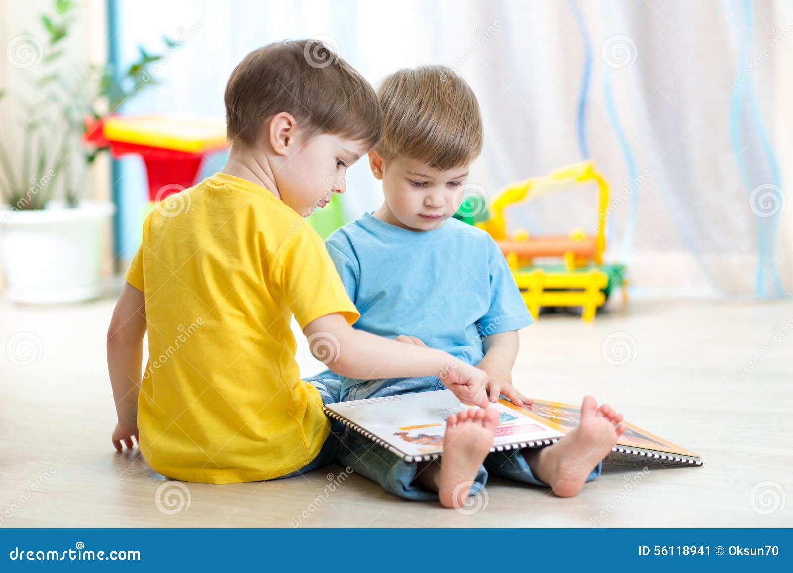 Children Read a Book Sitting on Floor at Home Stock Image - Image of ...