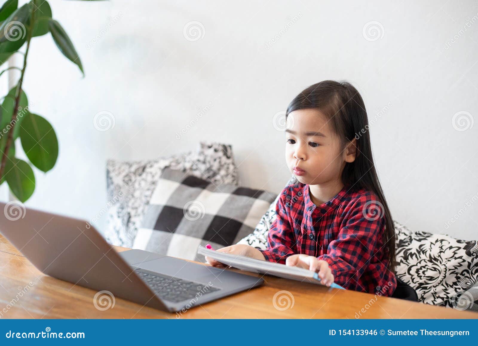 Children Read a Book and Watching Notebook Stock Photo - Image of ...