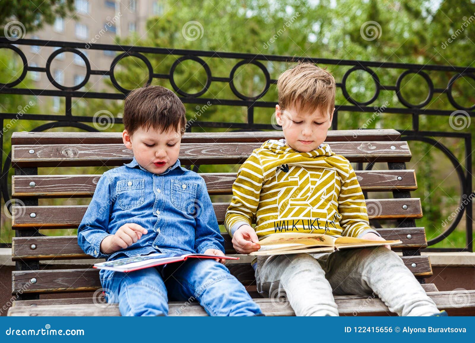 Children Read Books Outdoors Stock Photo - Image of beautiful, boys ...