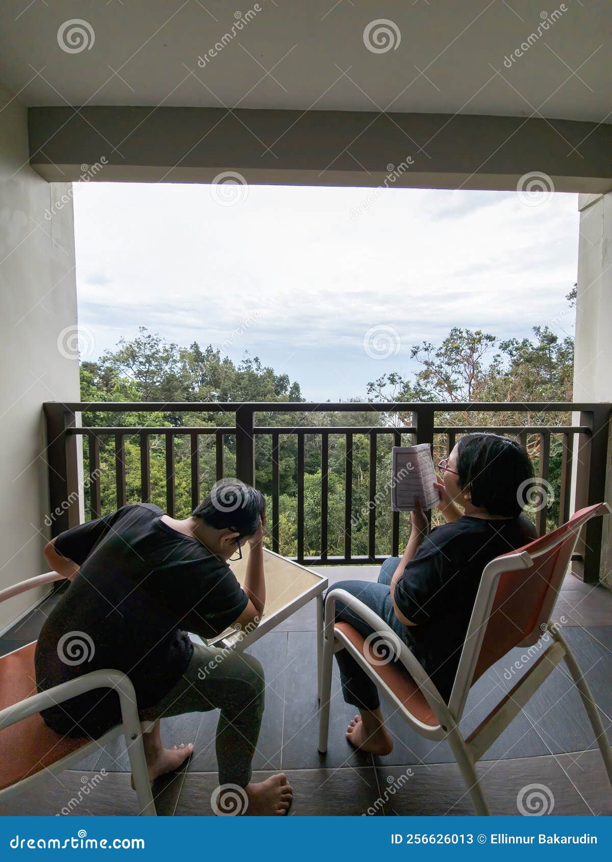 Children Reading at the Balcony while Enjoying the View of the Forest ...