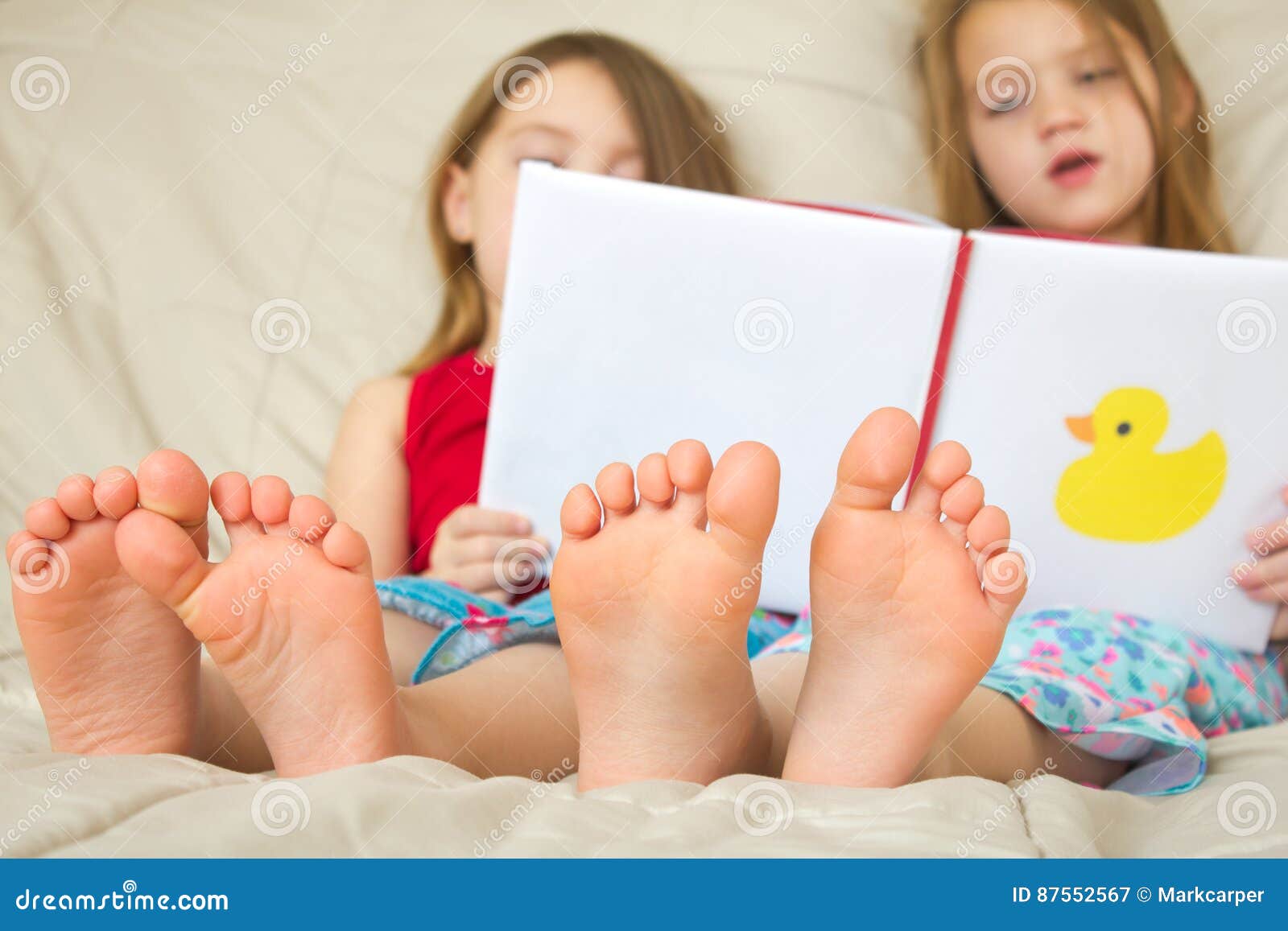 Feet Of Kids In Pajamas Stock Photo | CartoonDealer.com #75257262