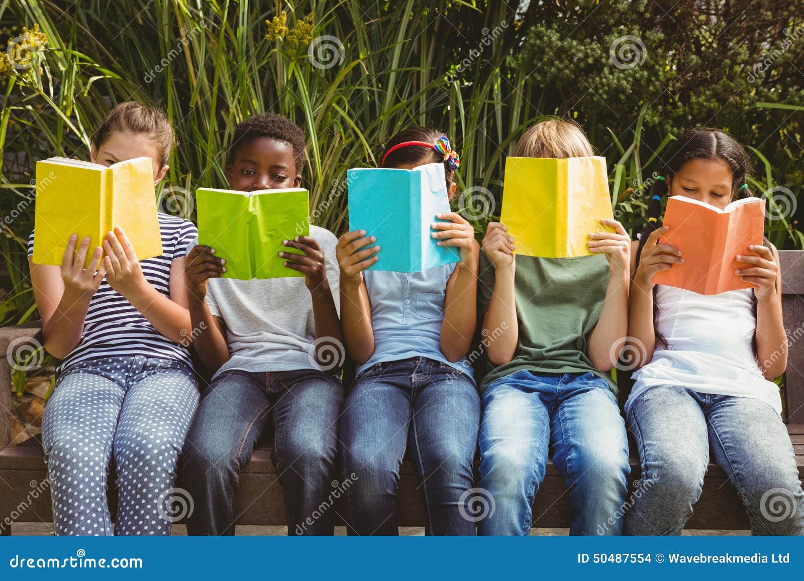 Children Sitting Row Reading Book Park Stock Photos - Free & Royalty ...