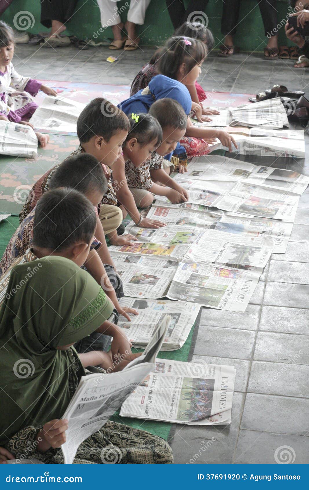 CHILDREN READING a NEWSPAPER on a NATIONAL PRESS Editorial Image ...