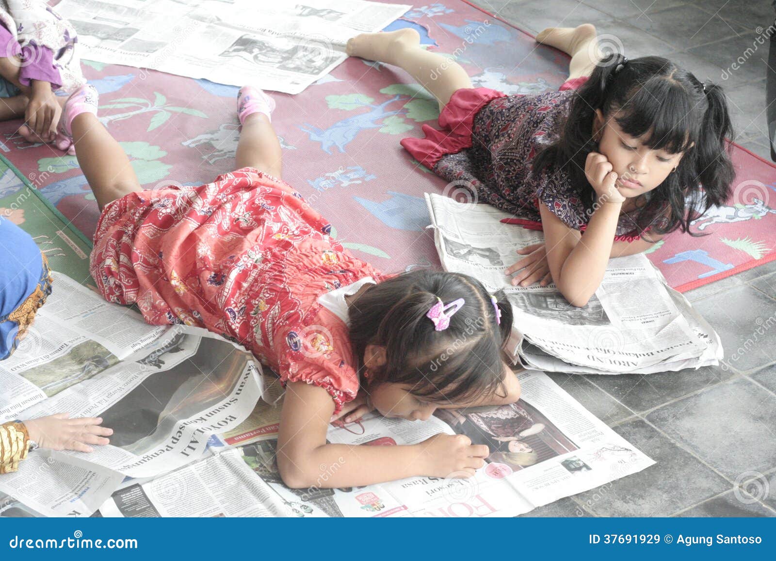 CHILDREN READING a NEWSPAPER on a NATIONAL PRESS Editorial Stock Image ...