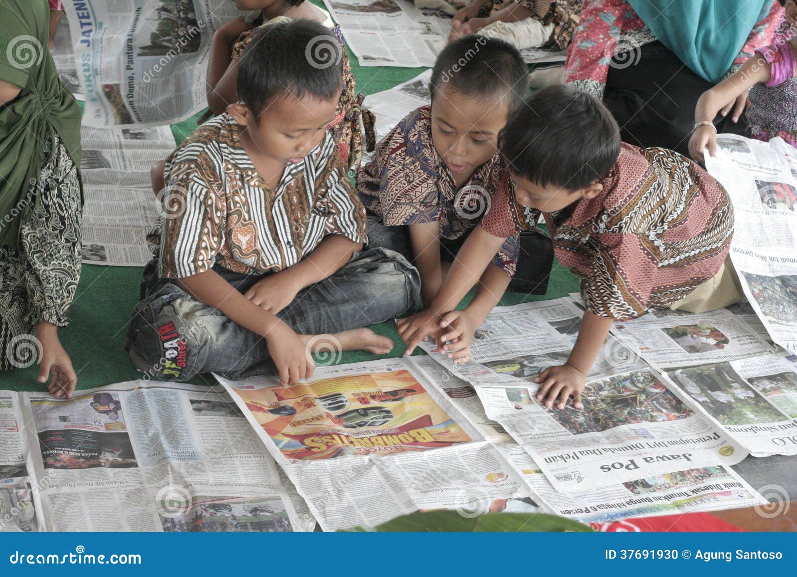CHILDREN READING a NEWSPAPER on a NATIONAL PRESS Editorial Image ...
