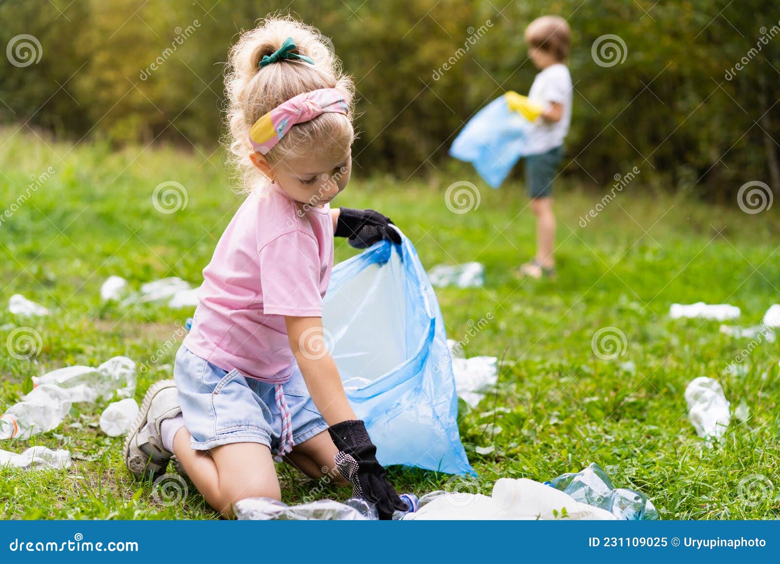Children Remove Plastic Garbage and Put it in a Biodegradable Garbage ...