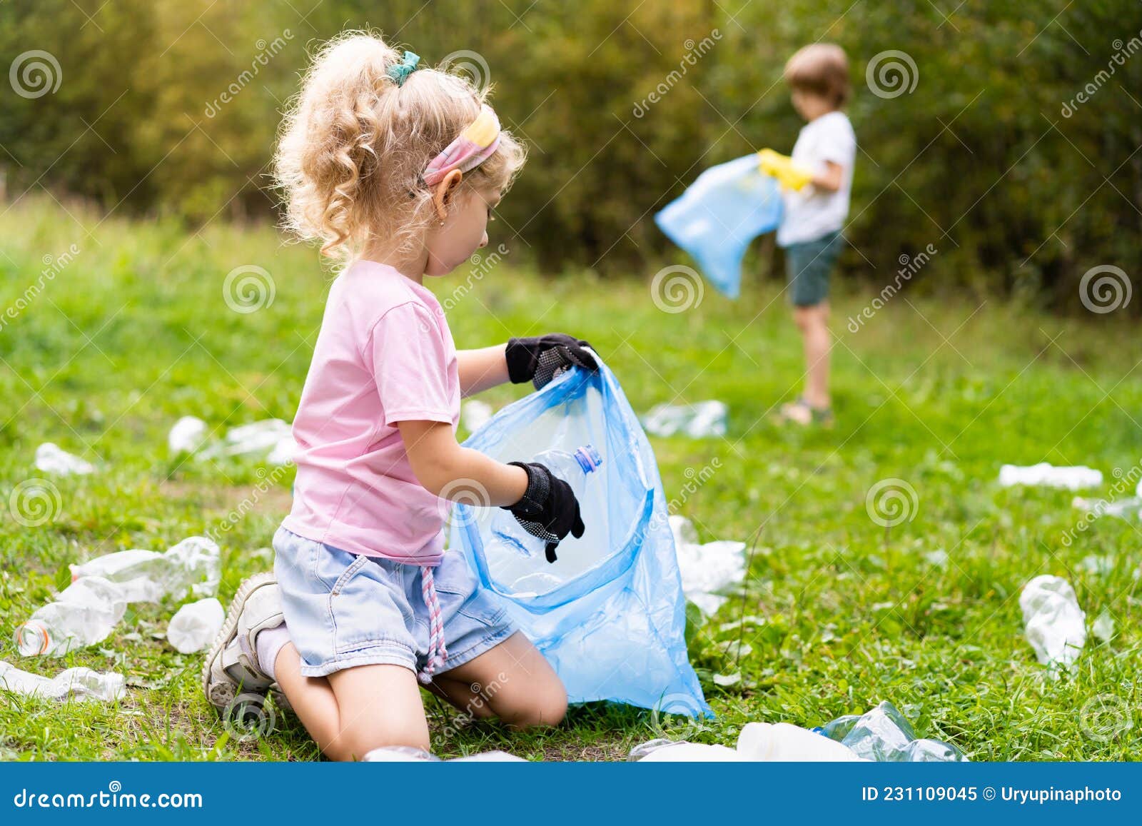 Children Remove Plastic Garbage And Put It In A Biodegradable Garbage ...