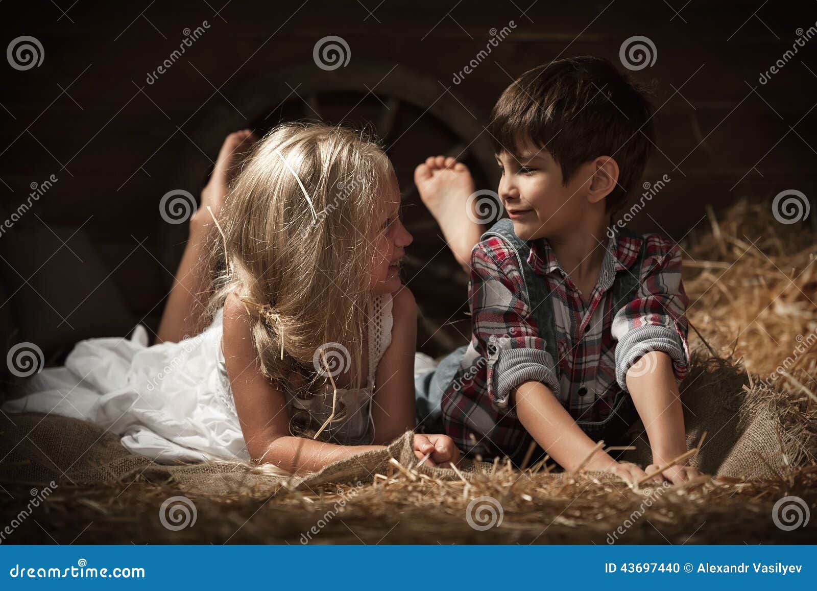 Children Rest Lying on Straw Stock Photo - Image of play, girl: 43697440
