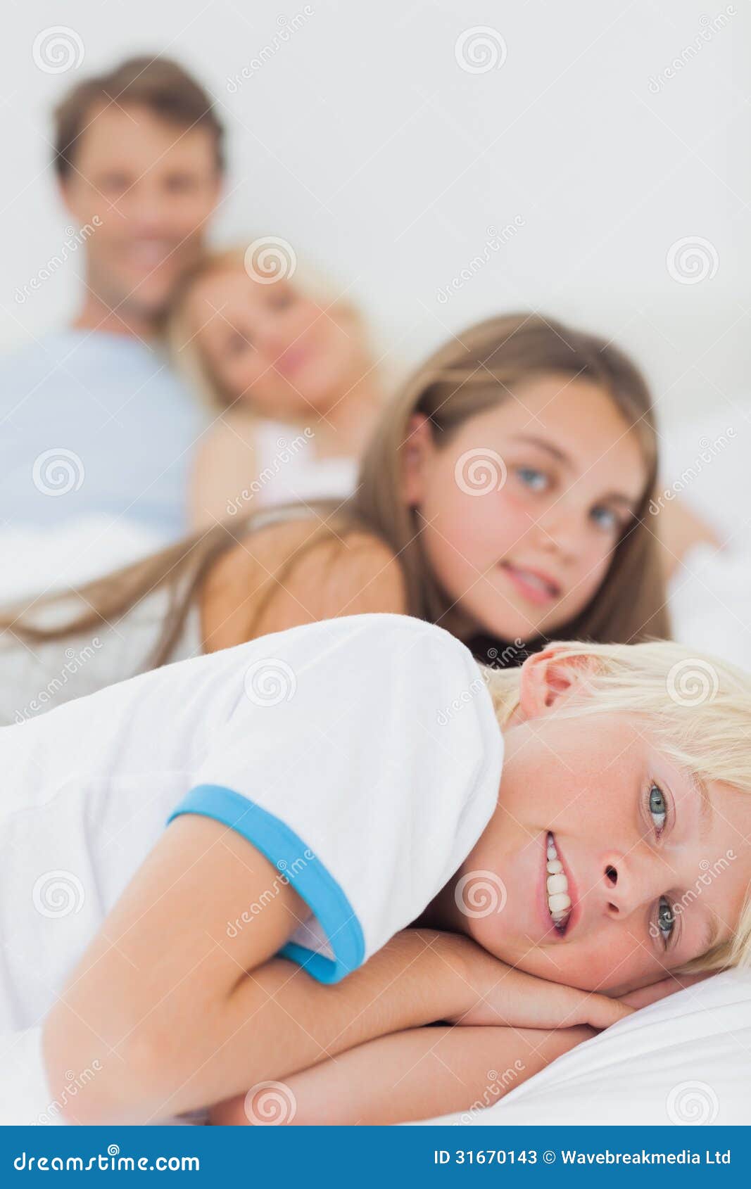 Children Resting in the Bed of Their Parents Stock Image - Image of ...
