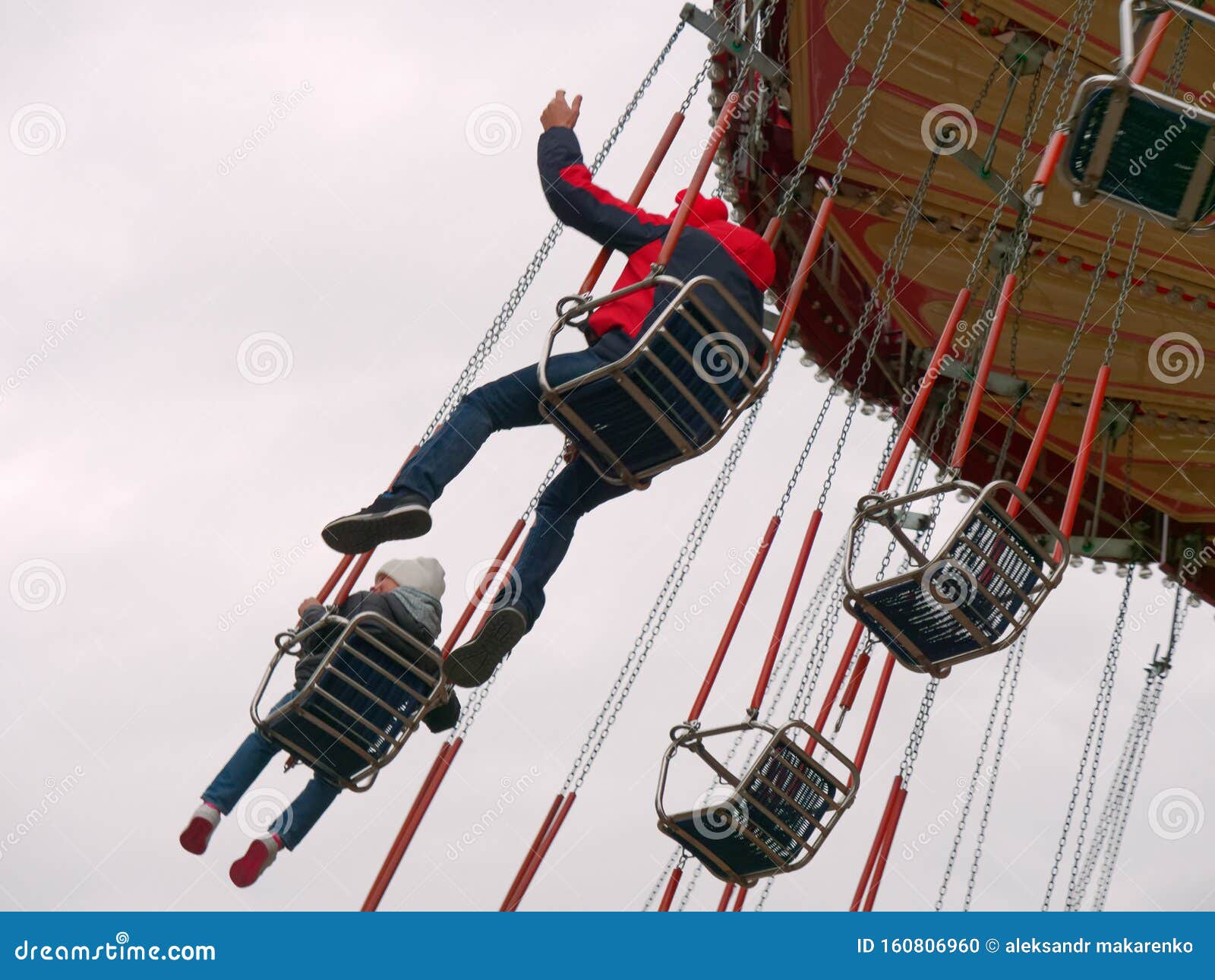 Children Ride on the Merry-go-round in the Fall Stock Photo - Image of ...
