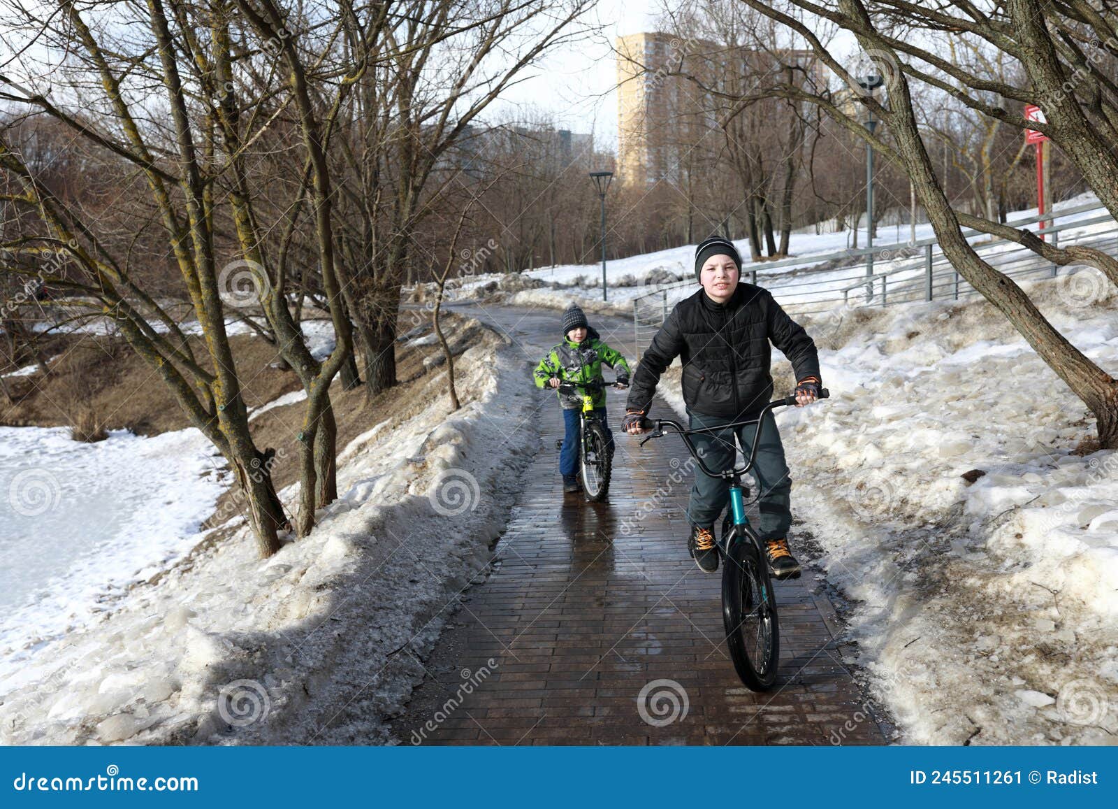 Children Riding Bikes on Sidewalk Stock Image - Image of childhood ...
