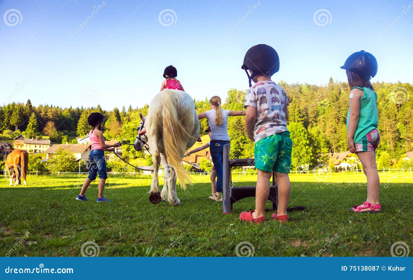 Children riding horse editorial photography. Image of ride - 75138087