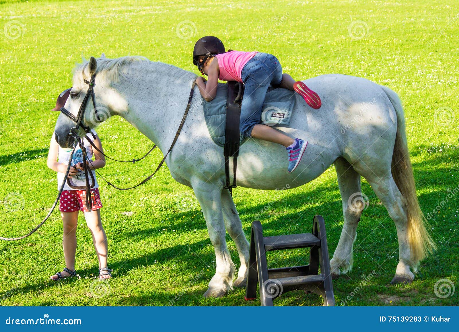 Children riding horse editorial stock photo. Image of female - 75139283