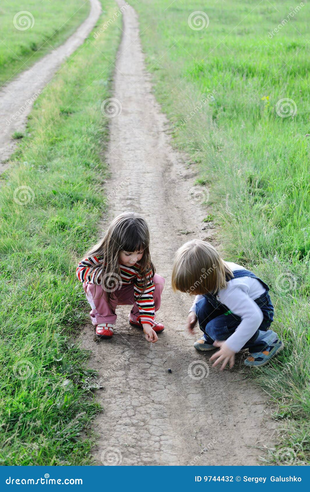 Children on road stock photo. Image of road, boys, meadow - 9744432