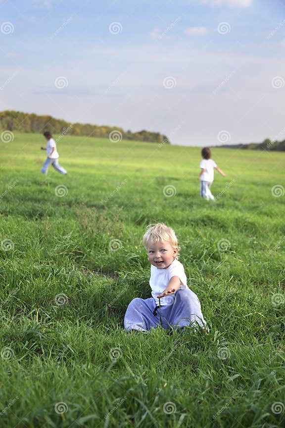 Children run on grass stock image. Image of color, child - 26787519