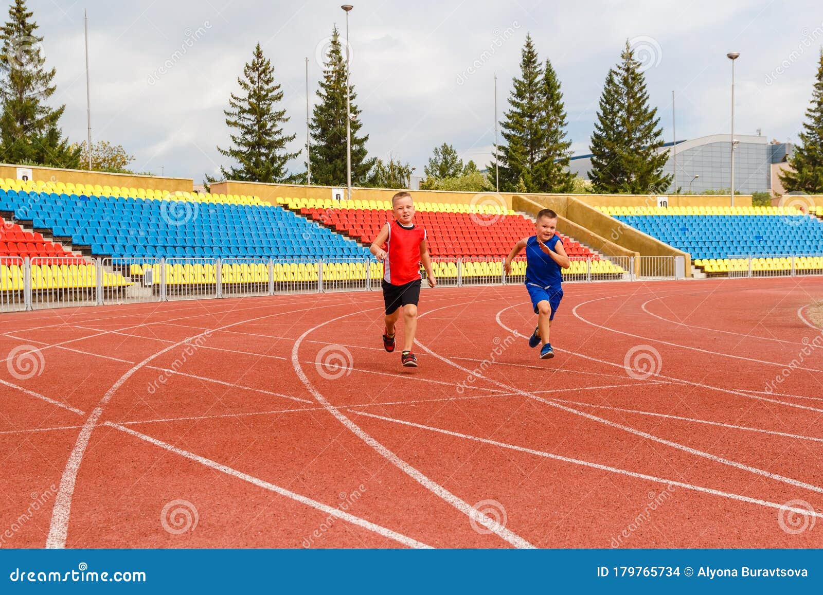 Children Run through the Sports Stadium Stock Photo - Image of game ...
