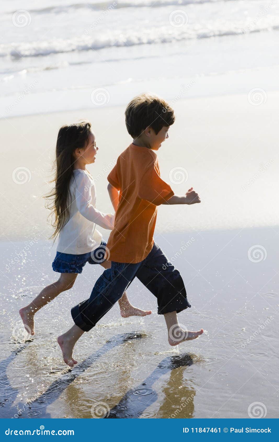 Children Running on Beach stock image. Image of asian - 11847461