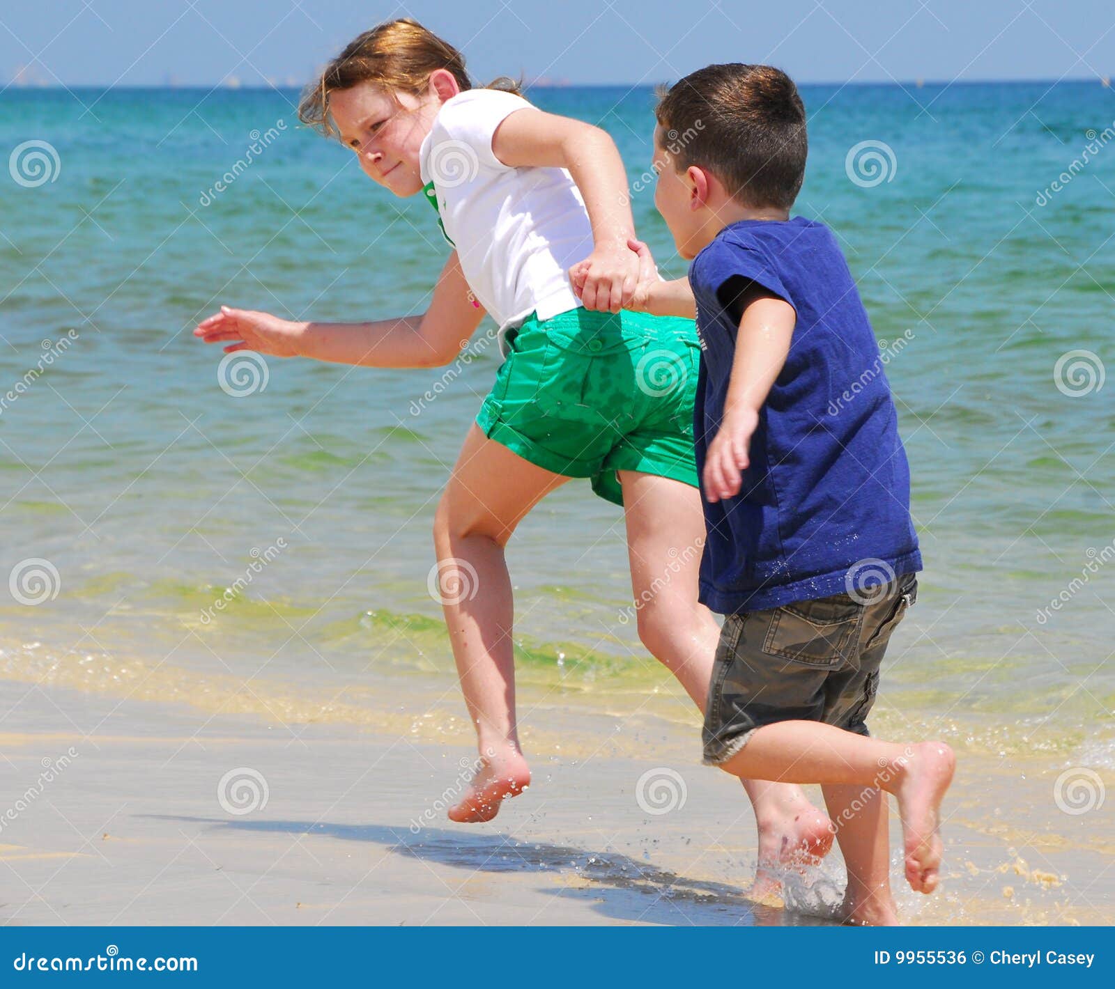 Children running on beach stock photo. Image of cute, florida - 9955536