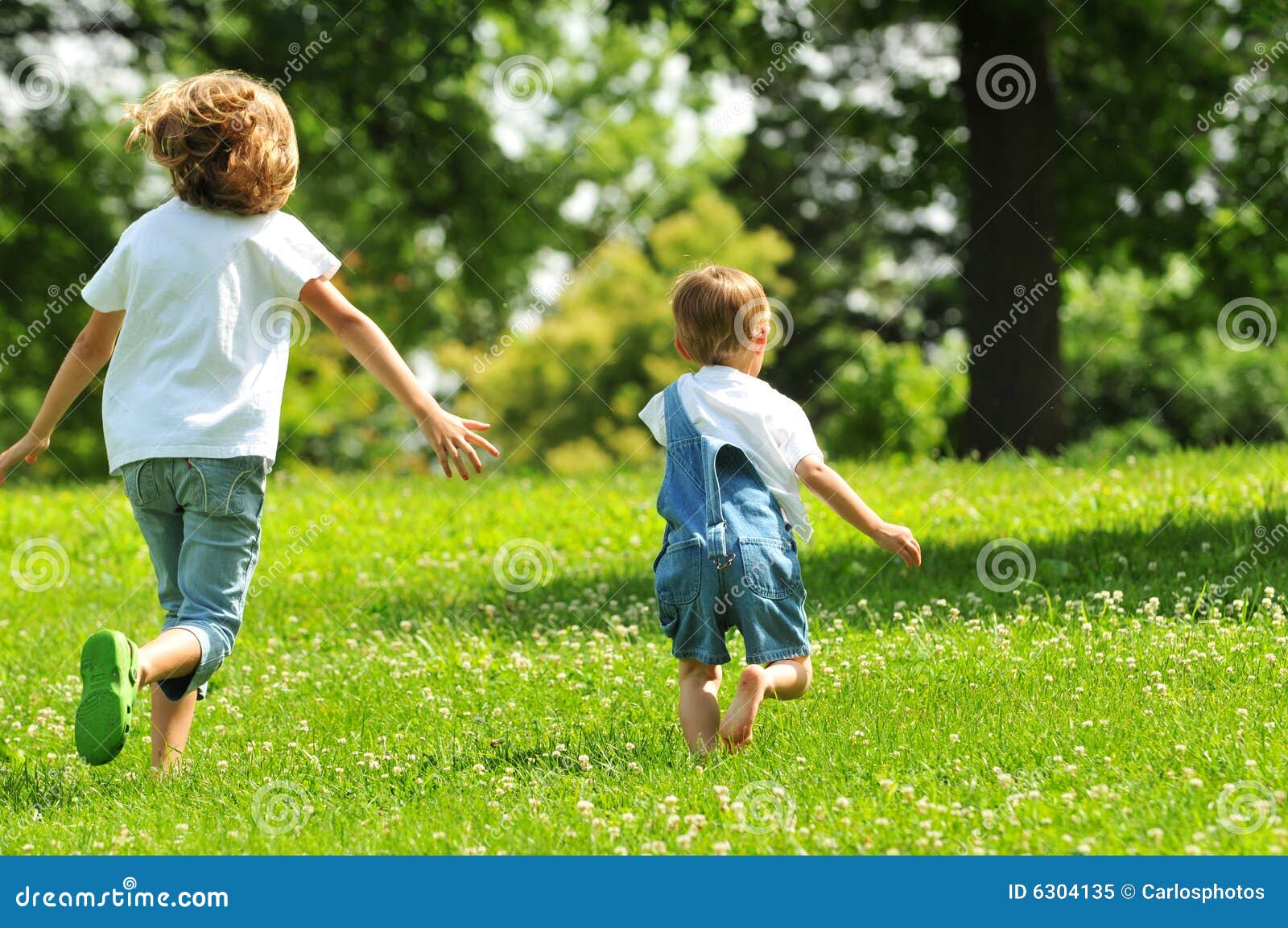 Children running outdoors stock image. Image of children - 6304135