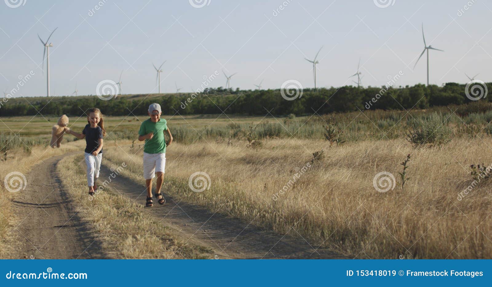 Children Running Over the Camera in Field Stock Image - Image of ...