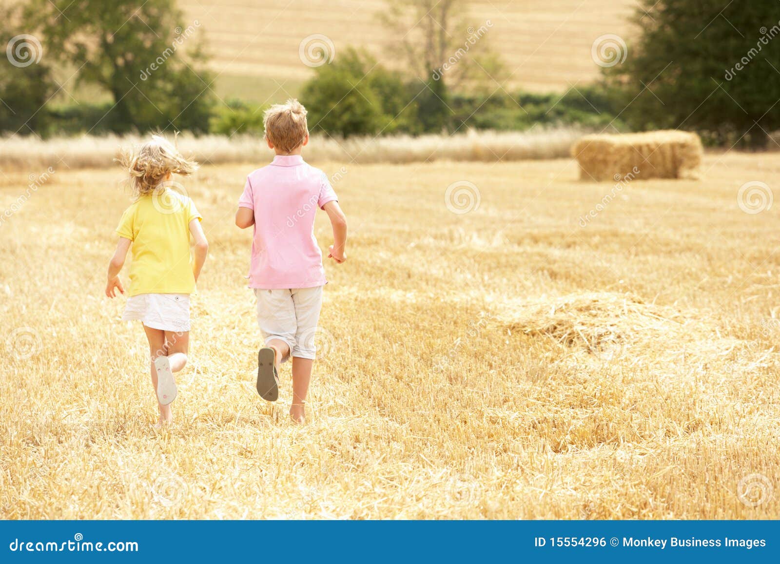 Children Running through Summer Harvested Field Stock Photo - Image of ...
