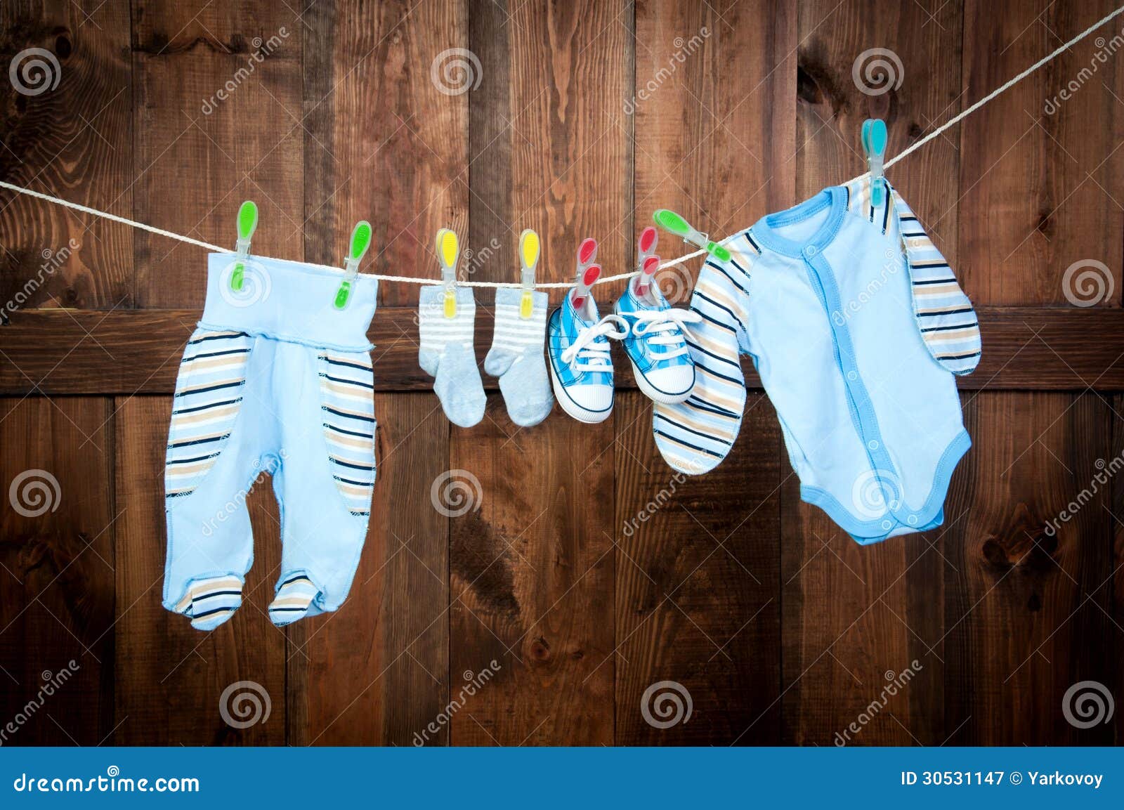 Children S Clothes Drying On The Clothesline. Stock Image - Image of ...