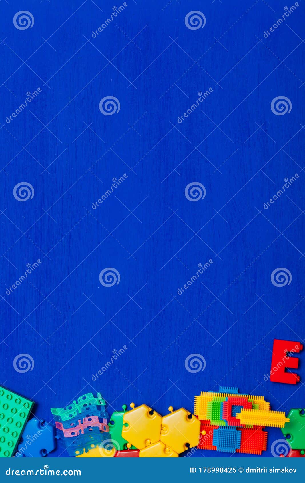 Children`s Developing Game Designer for Home on a Blue Background Stock ... Children`s Developing Game Designer for Home on a Blue Background Stock ...