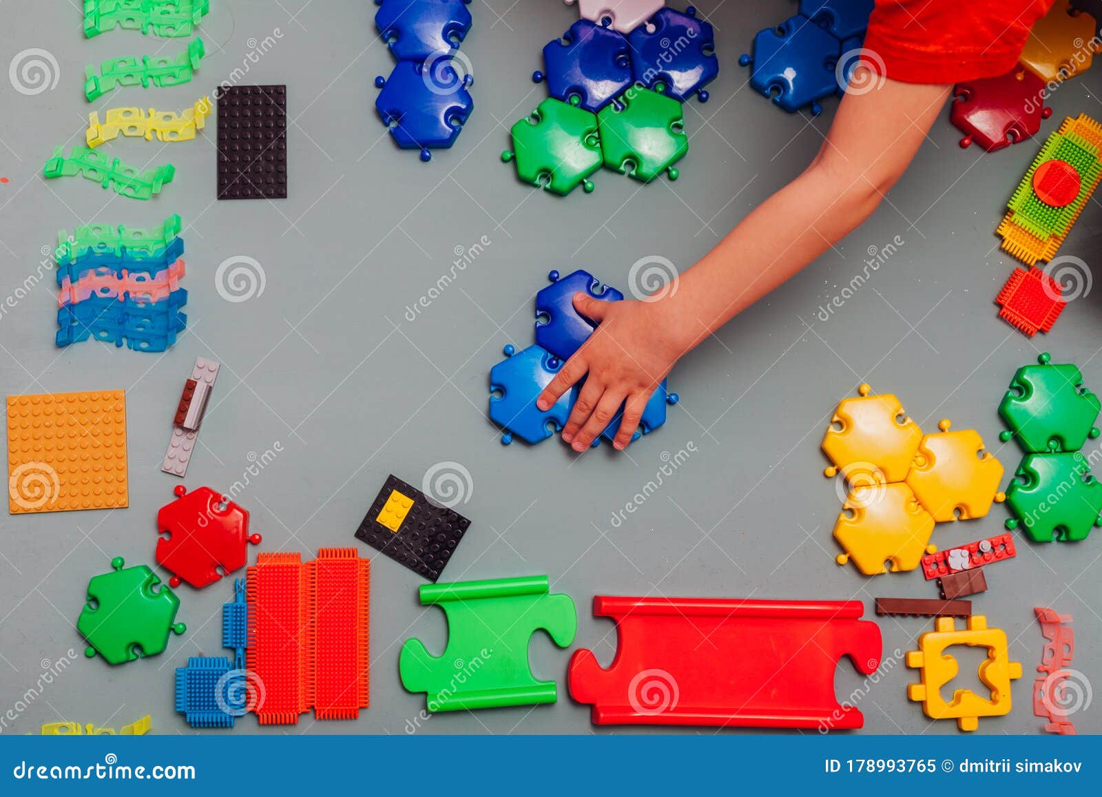 Children`s Developing Game Designer for Home on a Gray Background Stock ... Children`s Developing Game Designer for Home on a Gray Background Stock ...