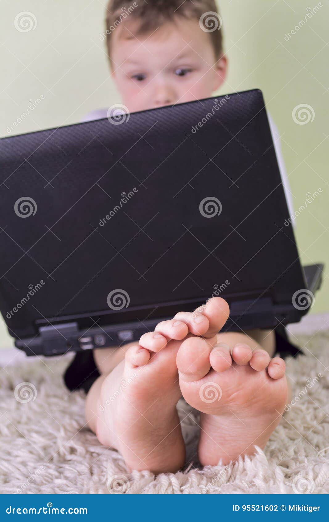 Children& X27;s Feet and Laptop Stock Photo - Image of excitement ...