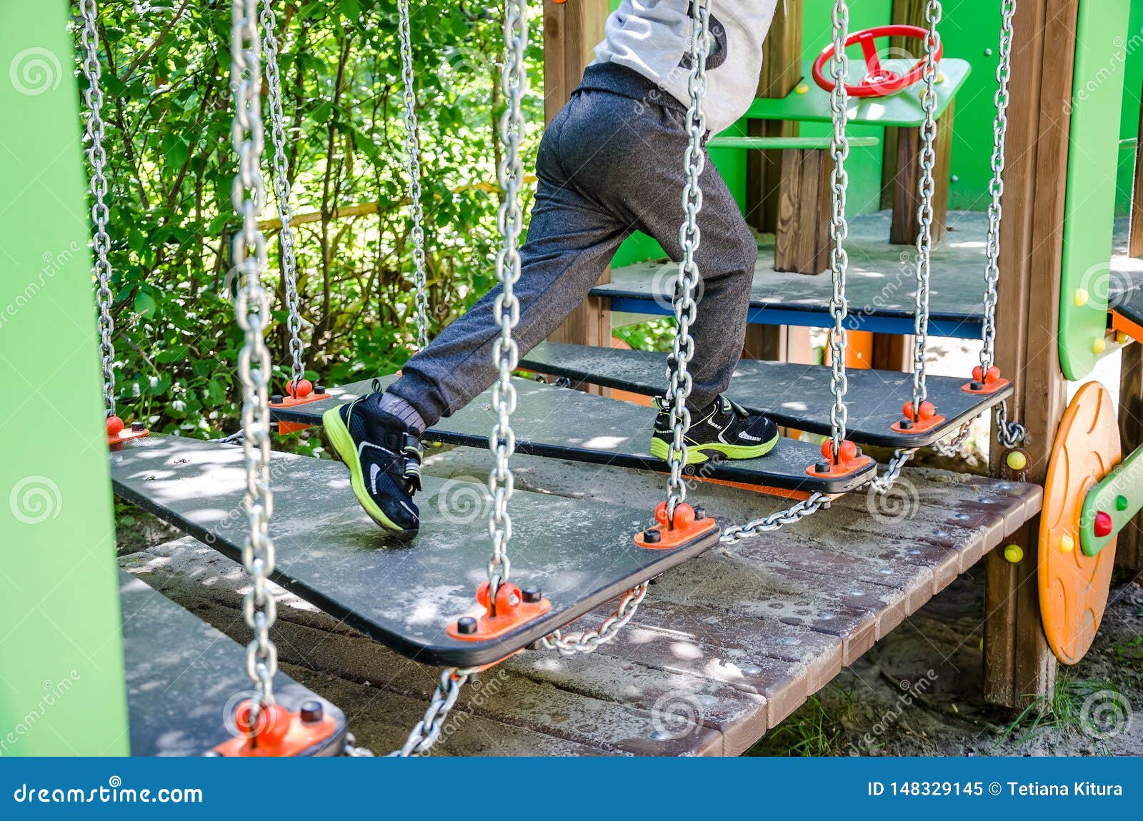 Children`s Feet Run on the Playground. Close-up Stock Image - Image of ...