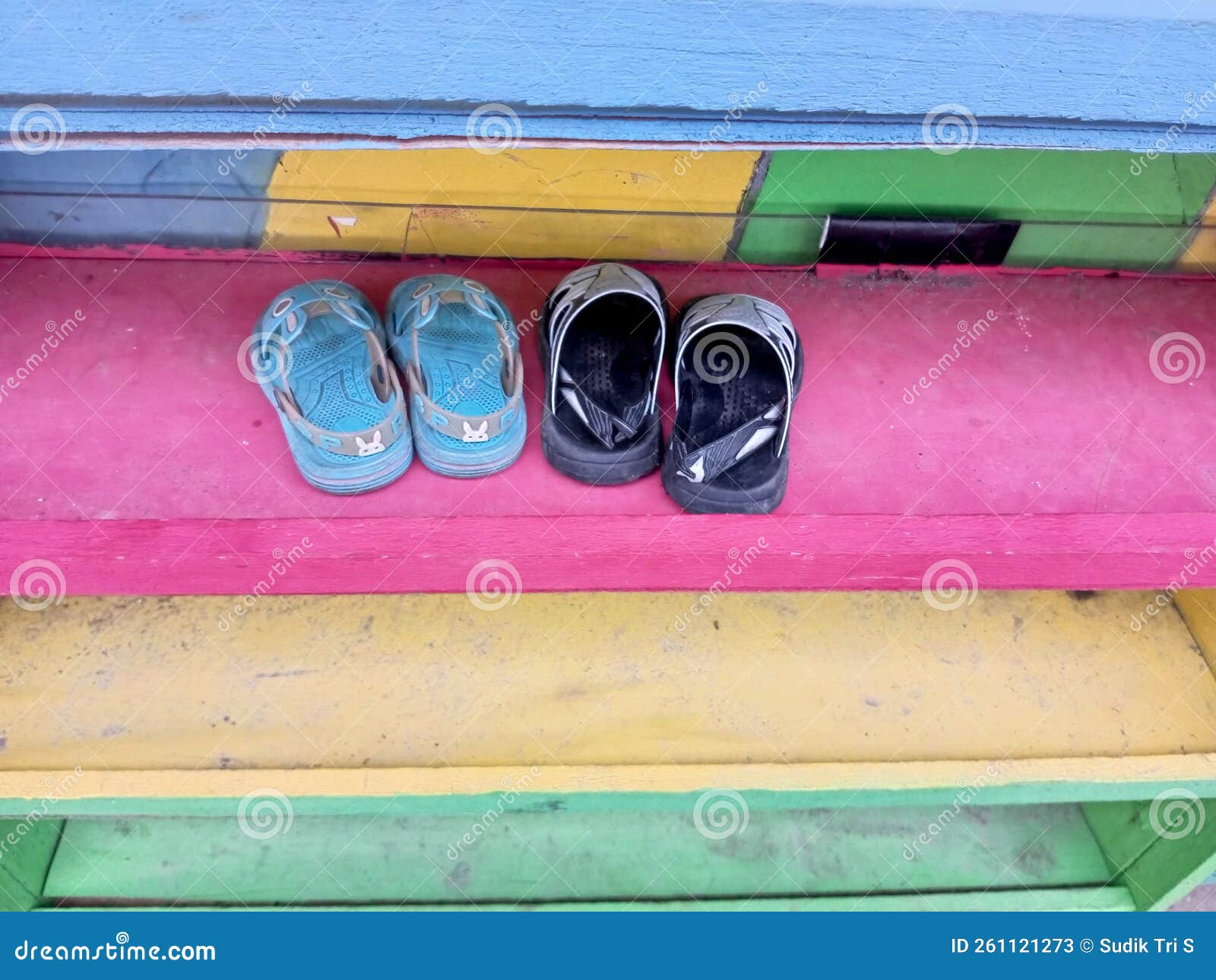 The Children S Flip-flops Left on the Shoe Rack Stock Image - Image of ...