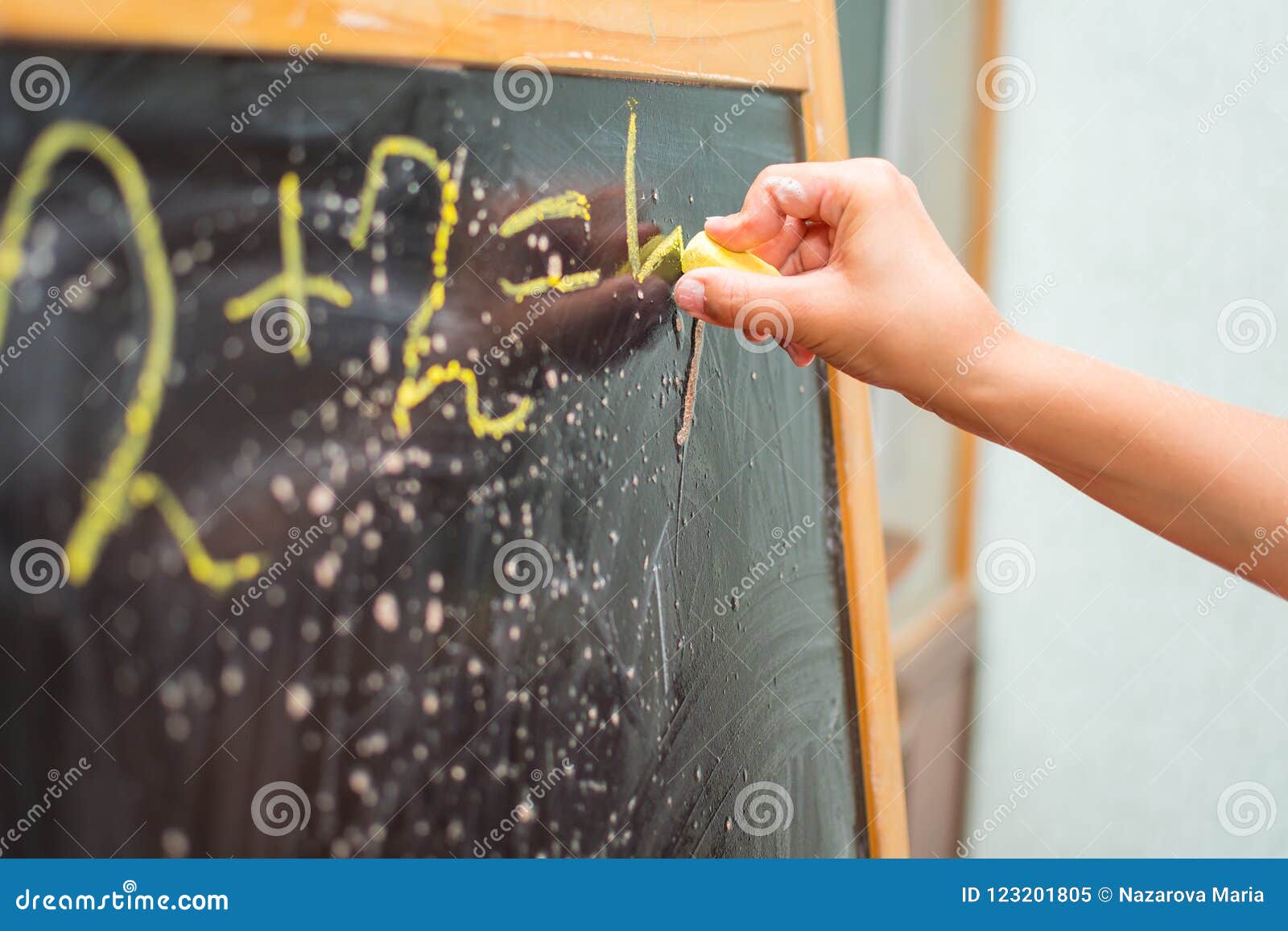 Children`s Hand with a Chalk Decides an Example of Close-up Stock Image ...