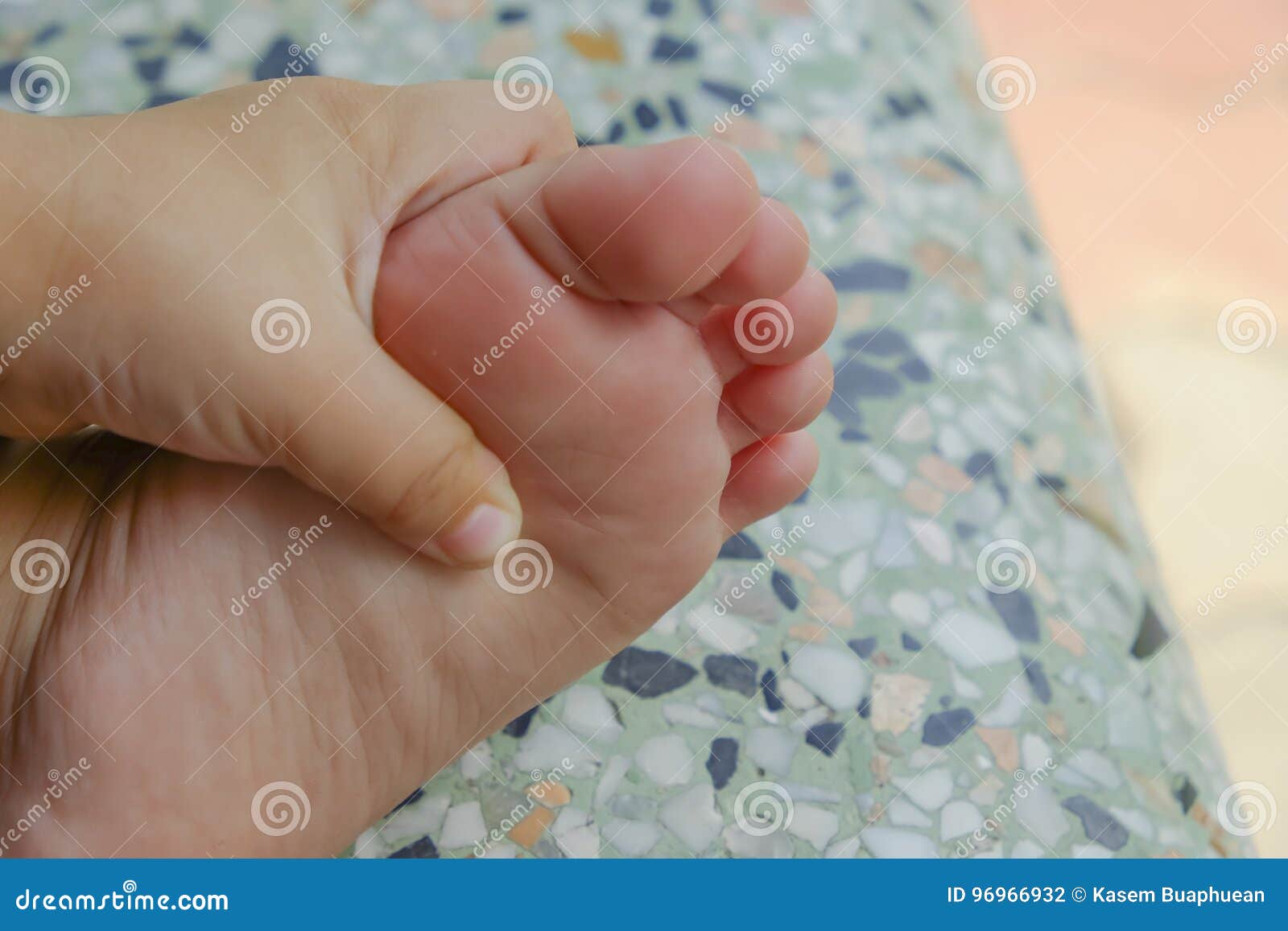 Children`s Hand Holding Foot Stock Photo - Image of girl, baby: 96966932