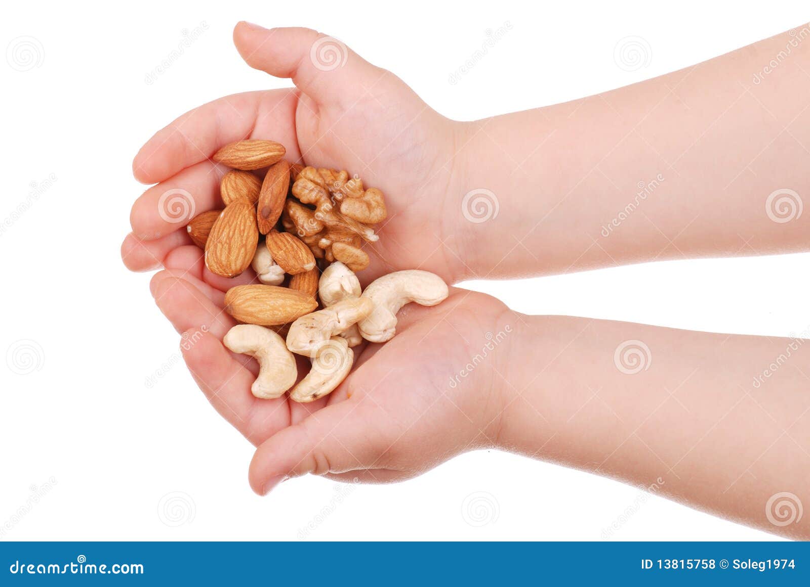 The Children S Hand Holds Nuts Stock Photo - Image of diet, isolate ...