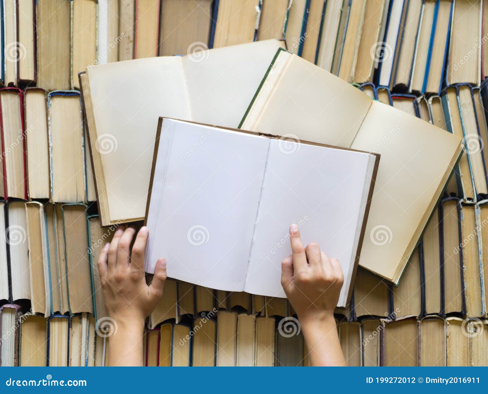 Children`s Hands with Books. the Child is Studying Science Stock Photo ...