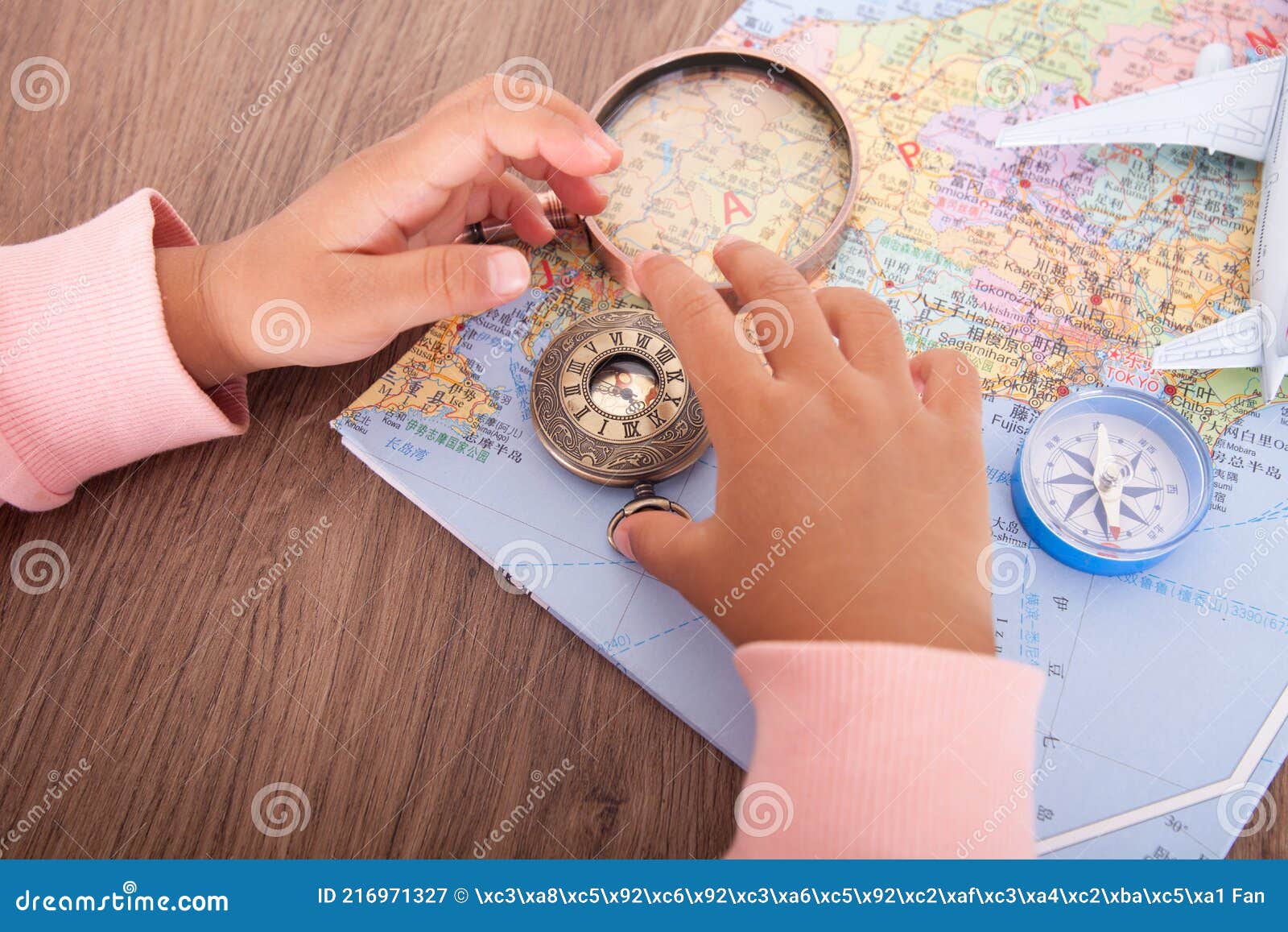 Children`s Hands Playing with Various Objects on the Map Stock Image ...