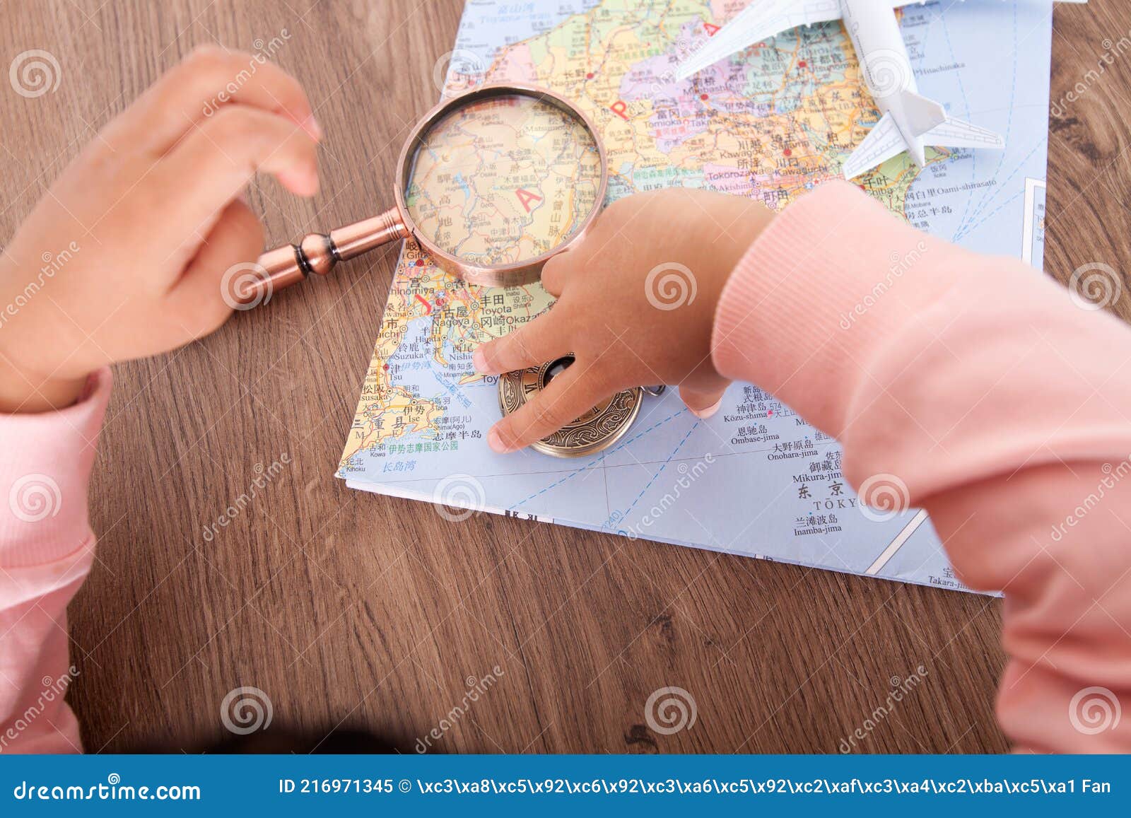 Children`s Hands Playing with Various Objects on the Map Stock Image ...