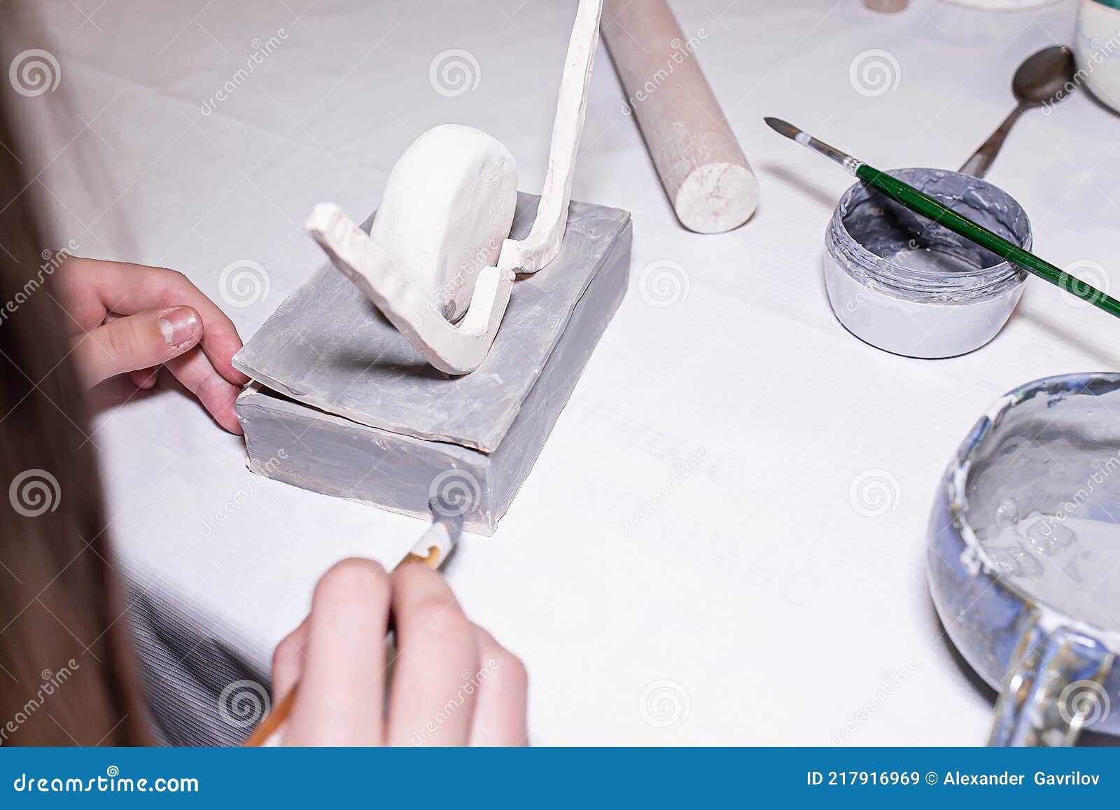 Children`s Hands in a Pottery Art Workshop Draw Their Work from Ceramic ...