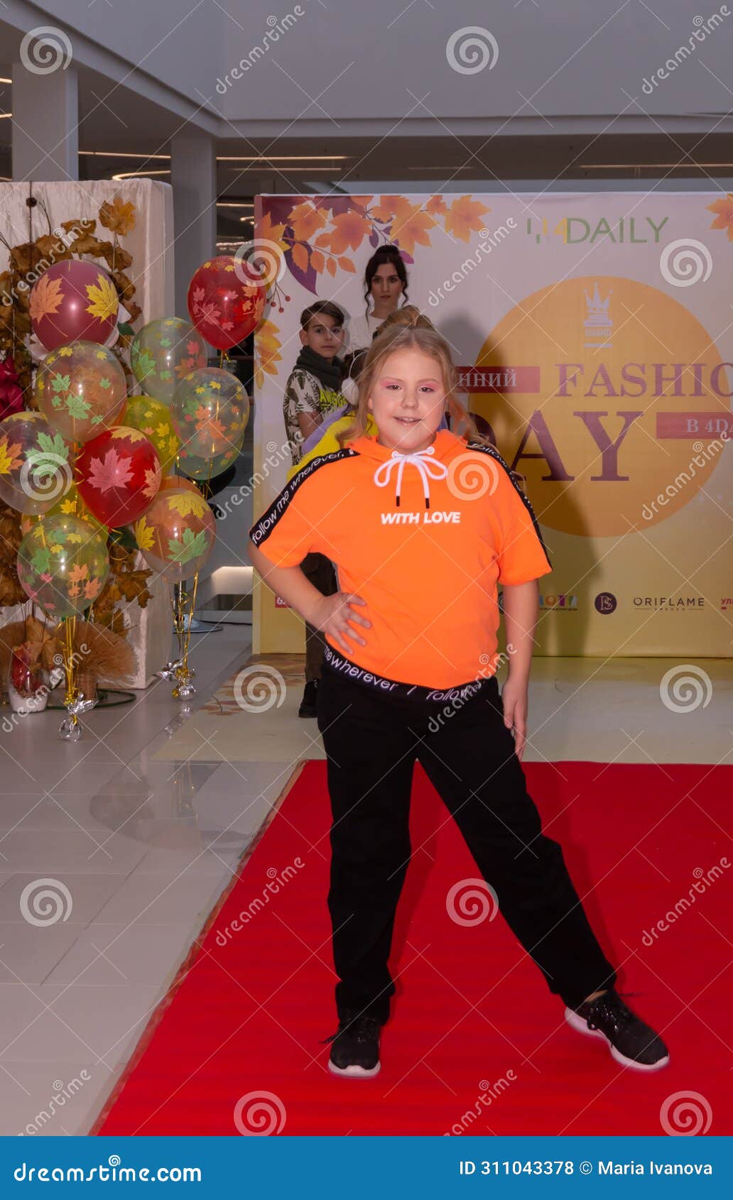 Children S Modeling. a Child Model on the Catwalk. Editorial Stock ...