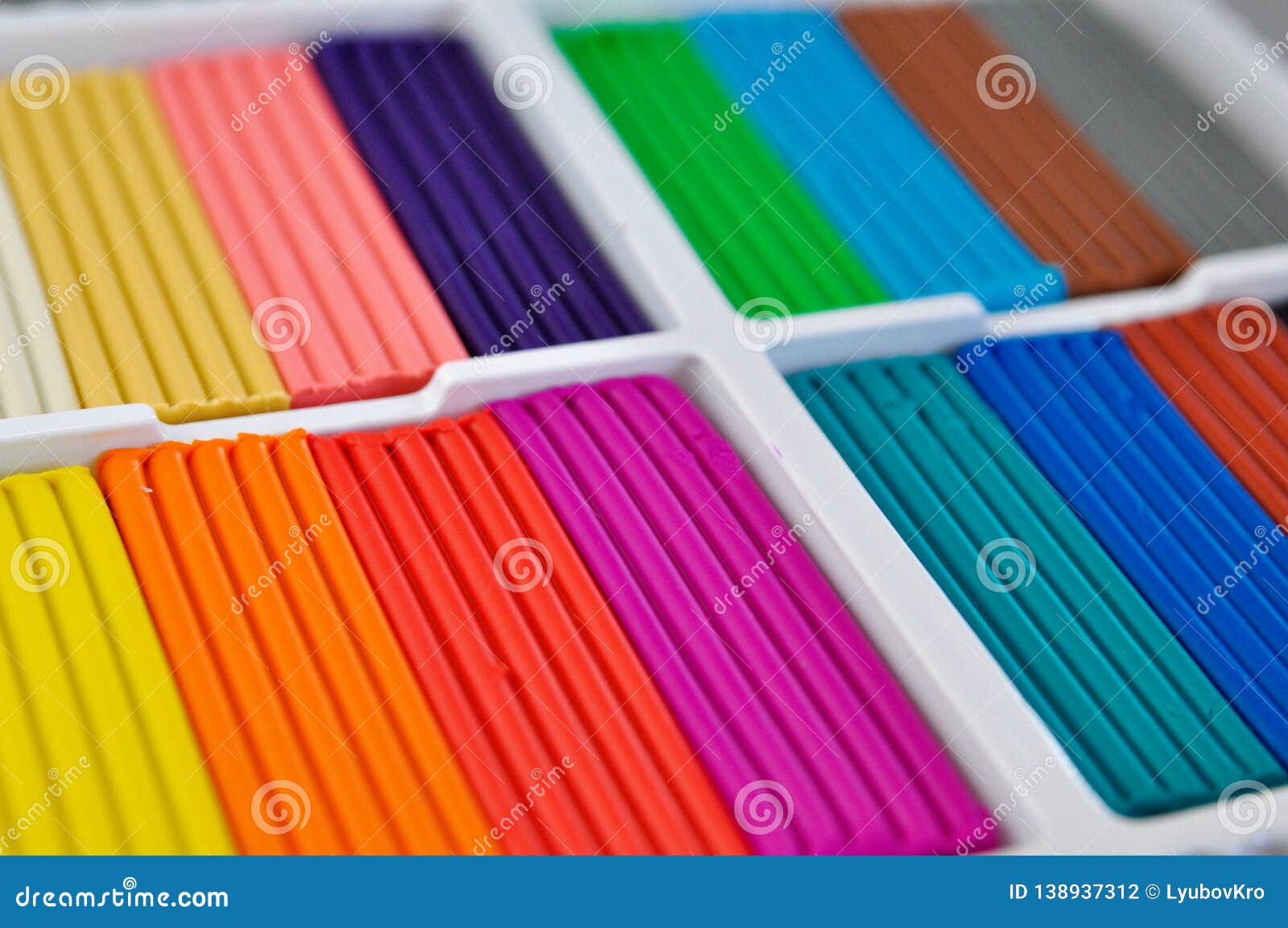 Children`s Multi-colored Plasticine in the Package Close-up. Study and ...