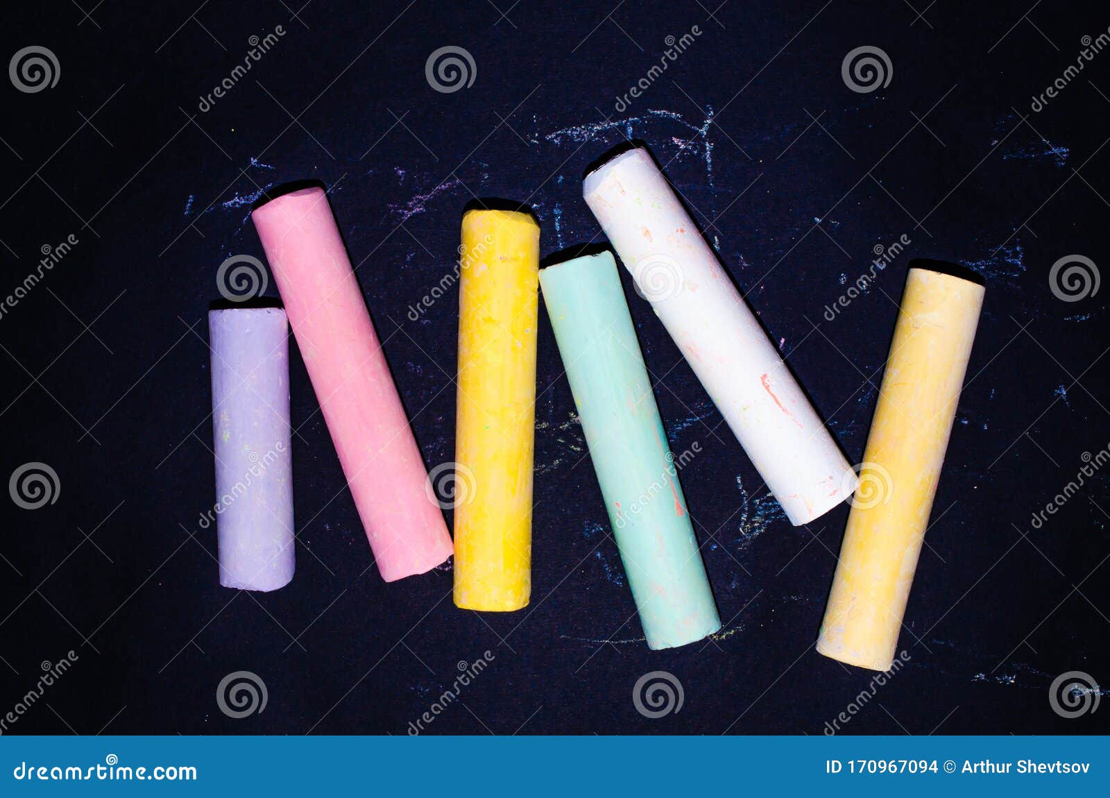 Children`s Multicolored Crayons on a Black Background. Chalk for ...