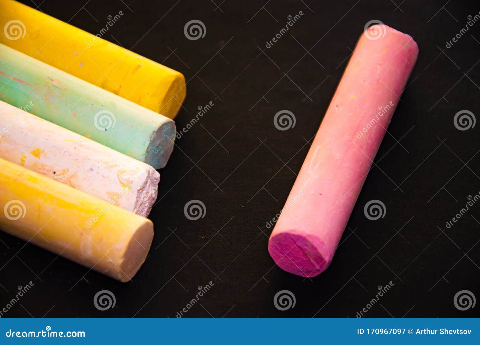 Children`s Multicolored Crayons on a Black Background. Chalk for ...