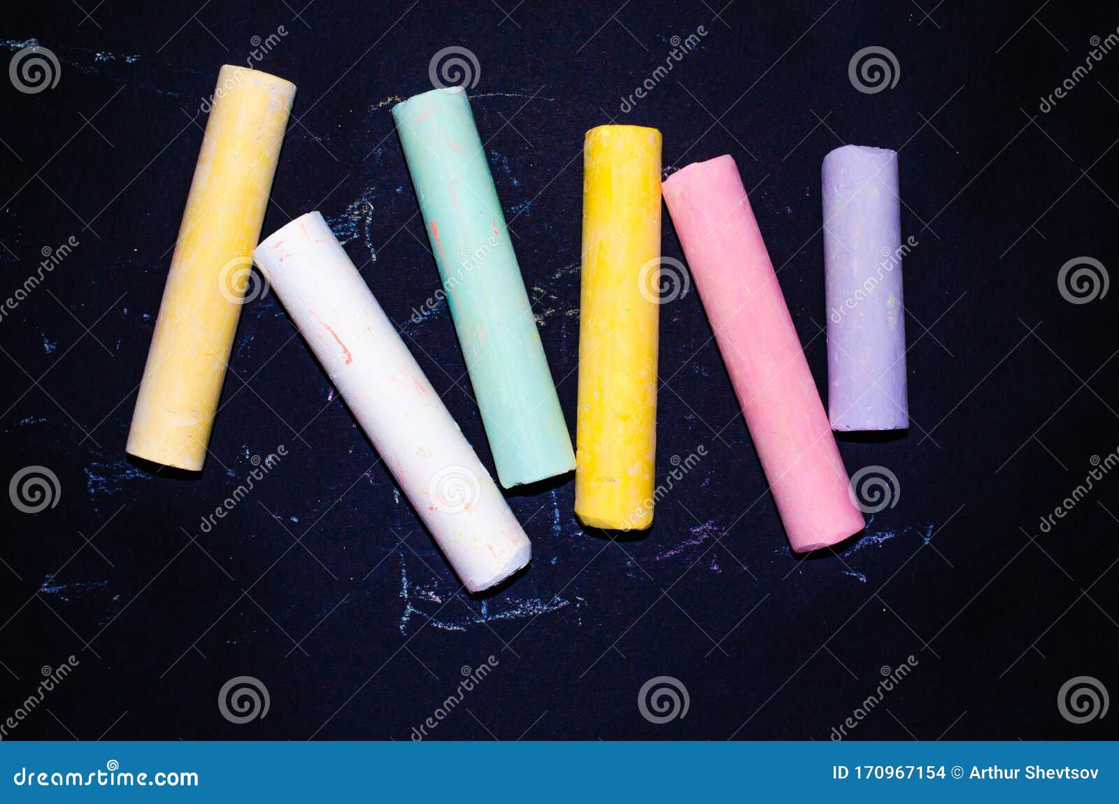 Children`s Multicolored Crayons on a Black Background. Chalk for ...