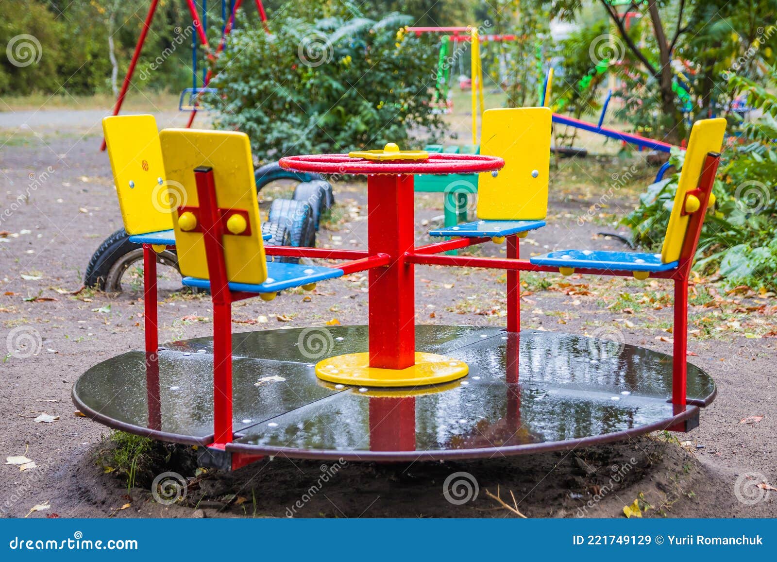 Children`s Playground after the Rain. Wet Swing with Rain Drops Stock ...