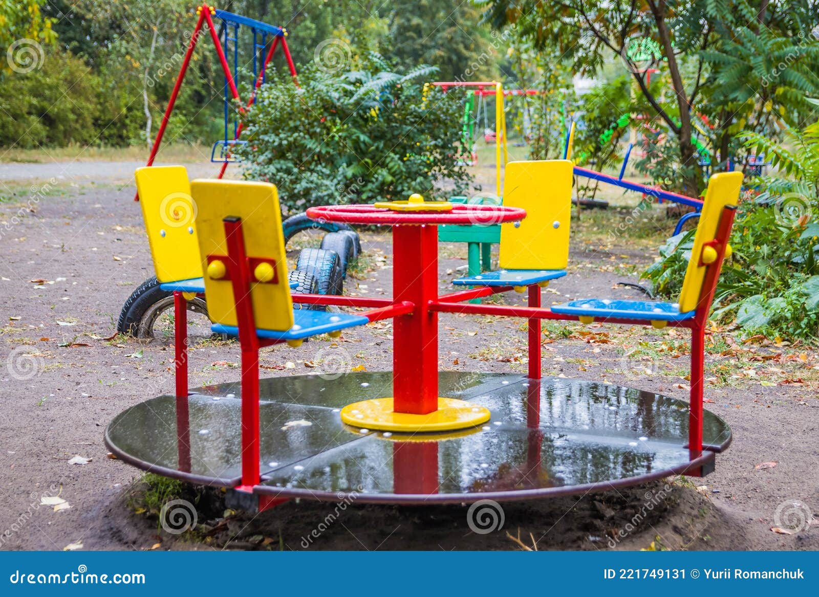 Children`s Playground after the Rain. Wet Swing with Rain Drops Stock ...