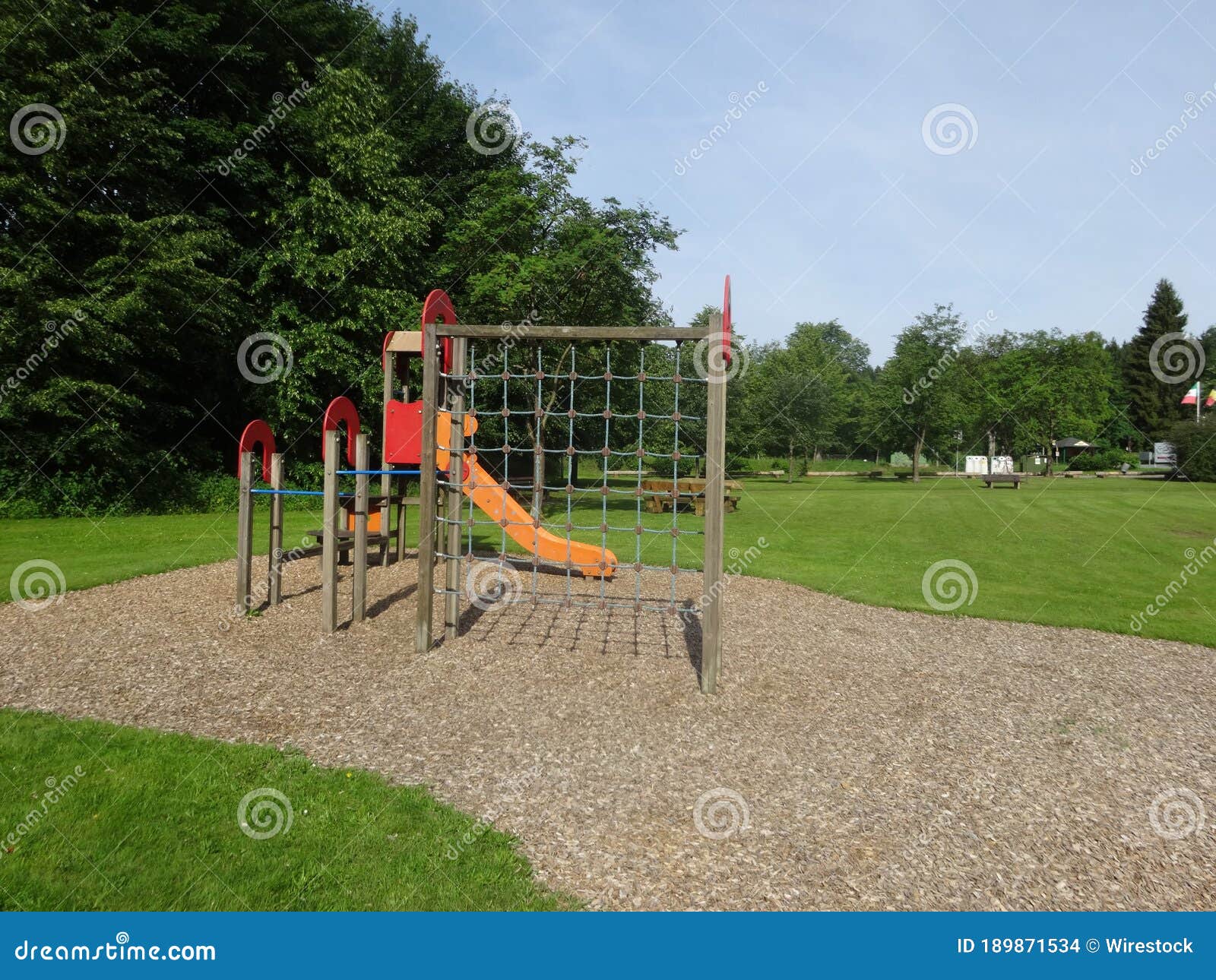 Children S Playground Set in a Park Surrounded by Trees Stock Photo ...